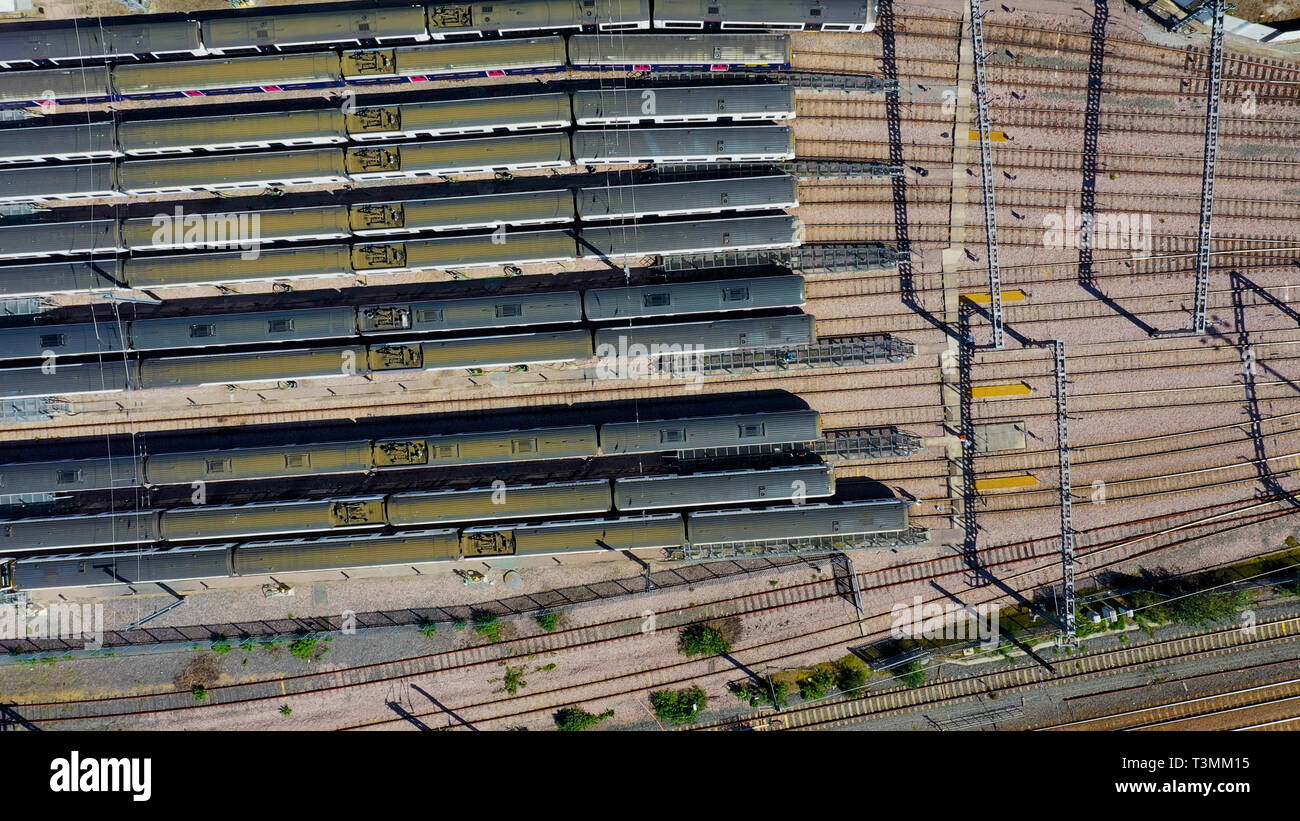 Aerial view over passenger trains in rows at a station Stock Photo - Alamy