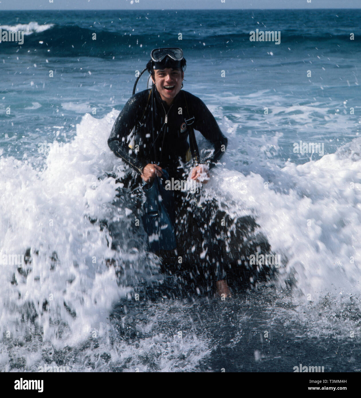 Deutscher Komponist, Sänger und Gitarrist Henner Hoier posiert im ...