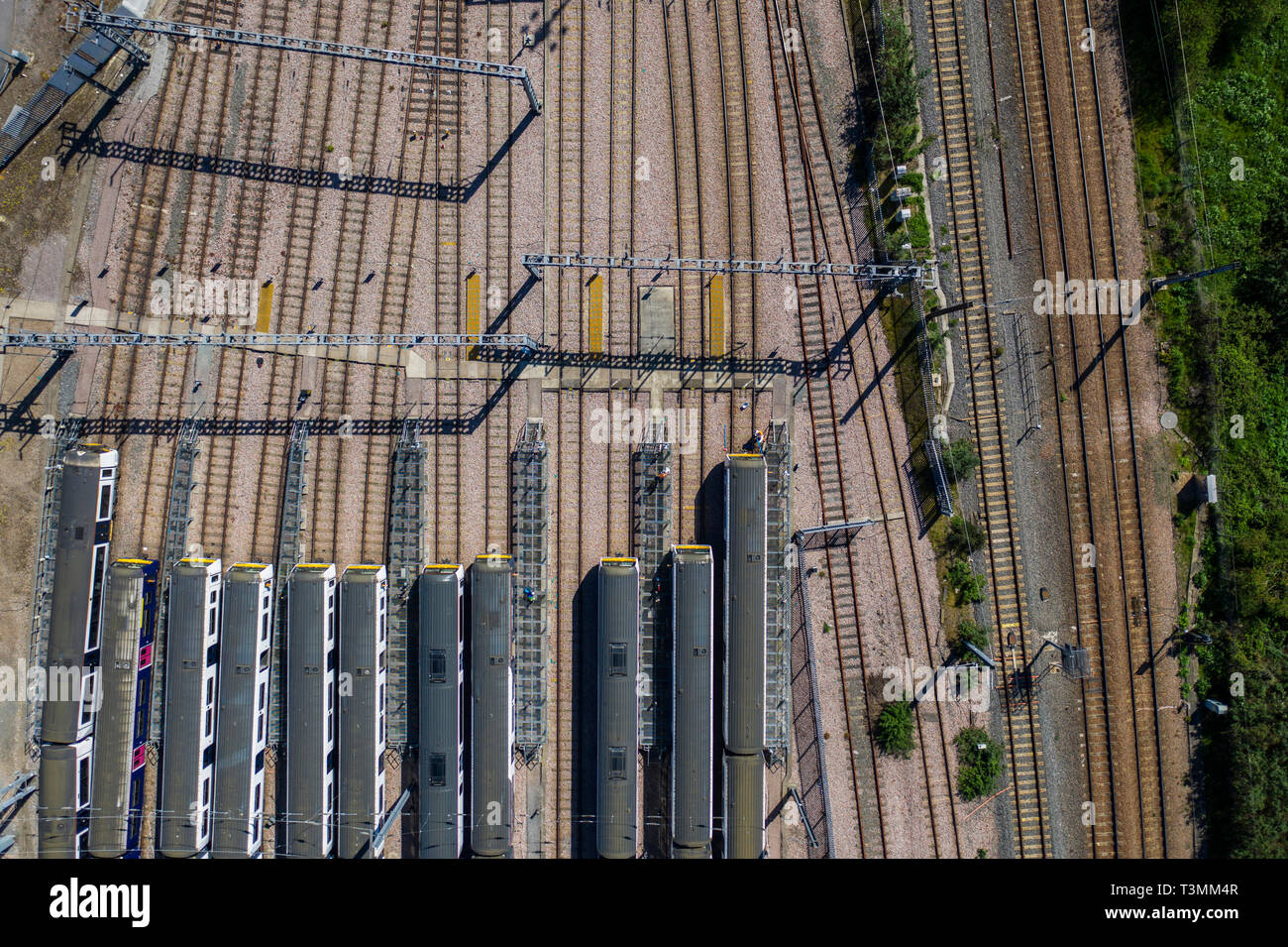 Aerial view over passenger trains in rows at a station Stock Photo - Alamy