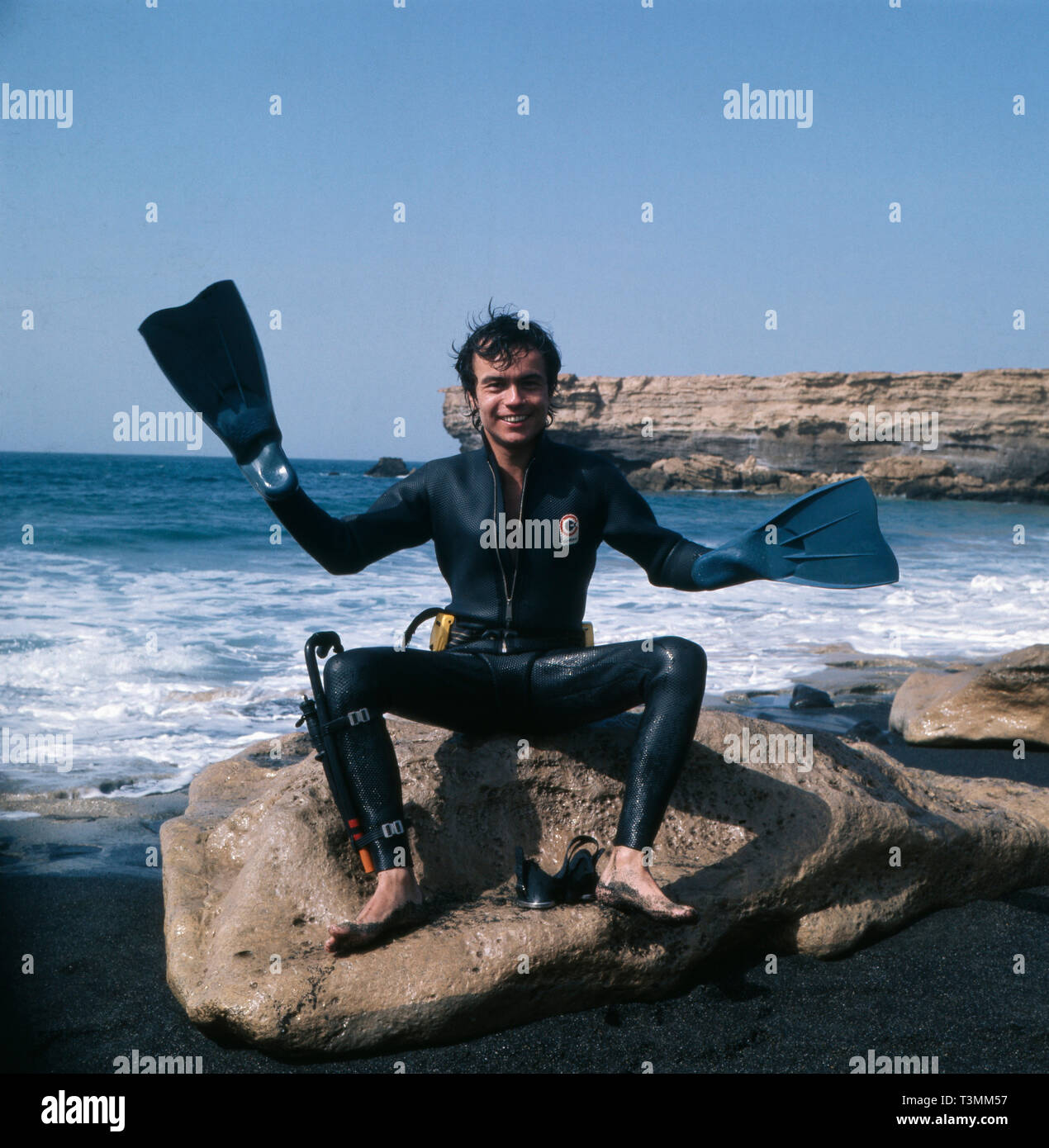 Deutscher Komponist, Sänger und Gitarrist Henner Hoier posiert im ...