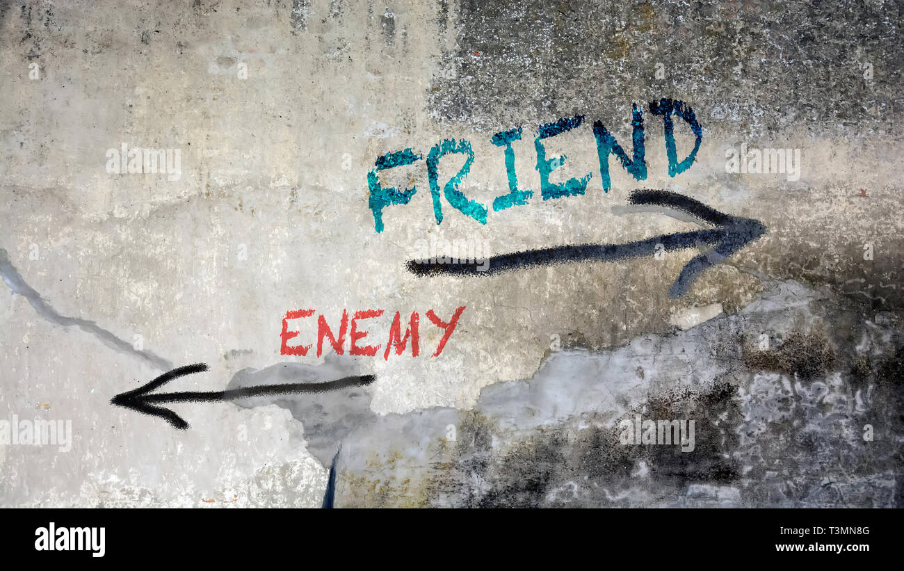 Street Graffiti Friend versus Enemy Stock Photo - Alamy