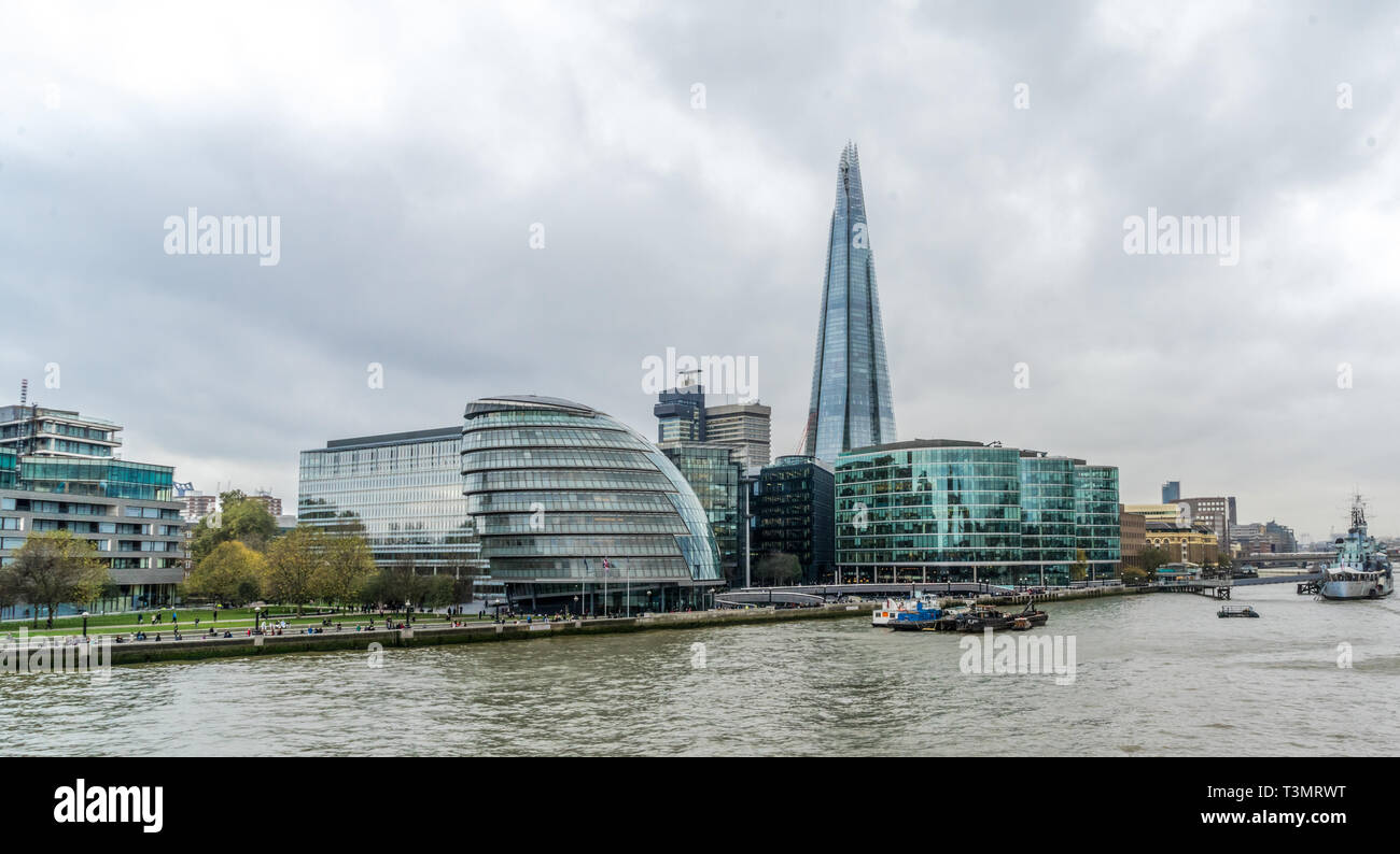 View across the River Thames, The Shard and City Hall in central London ...