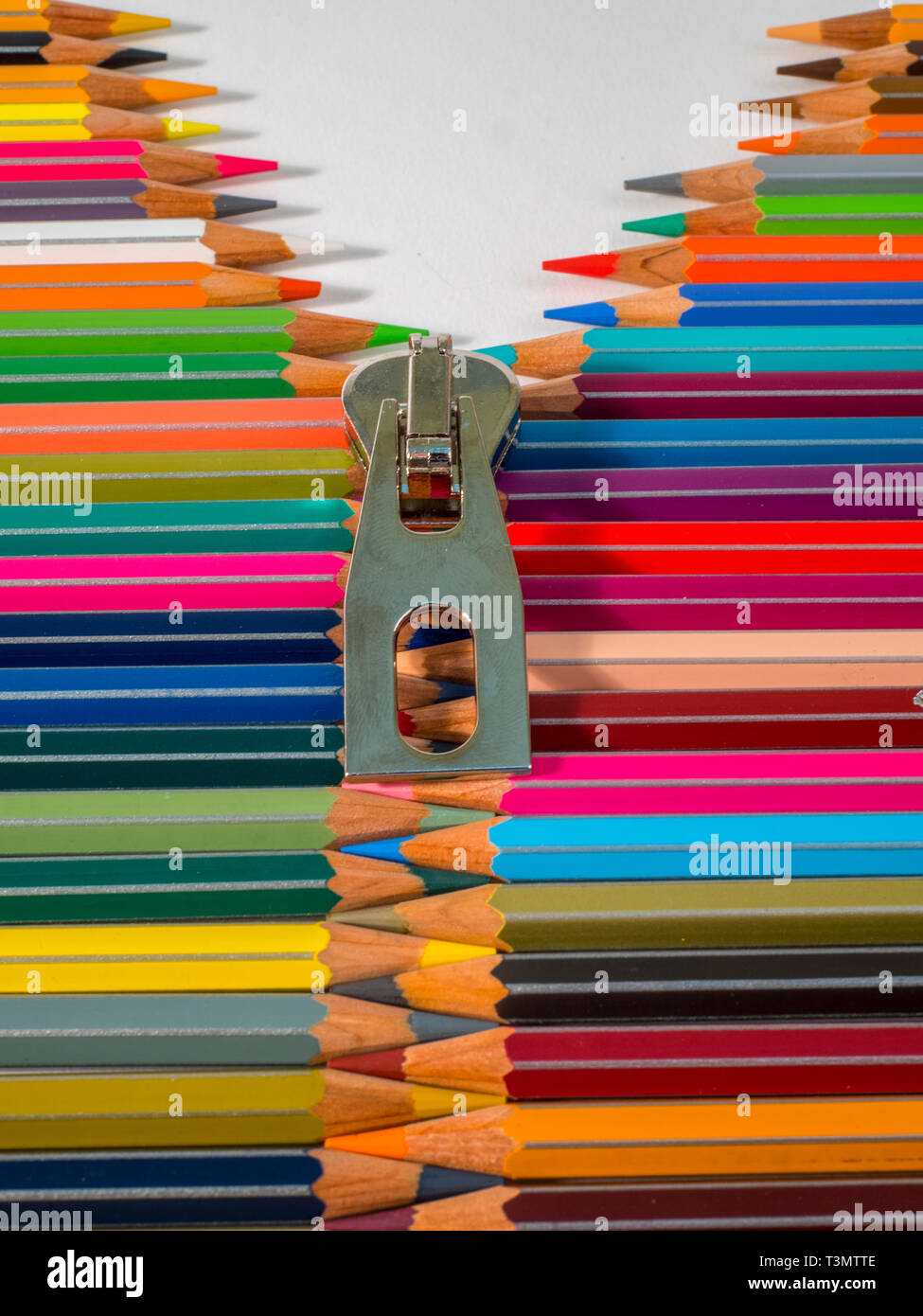 Sharpened coloured pencil crayons with a zip Stock Photo - Alamy