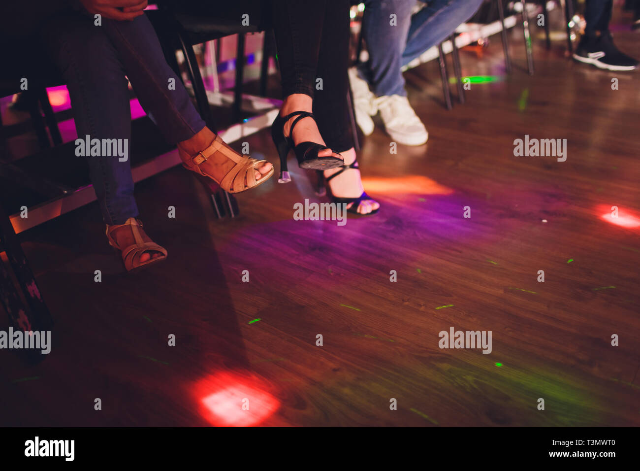 Legs of dancing people at the party Stock Photo - Alamy