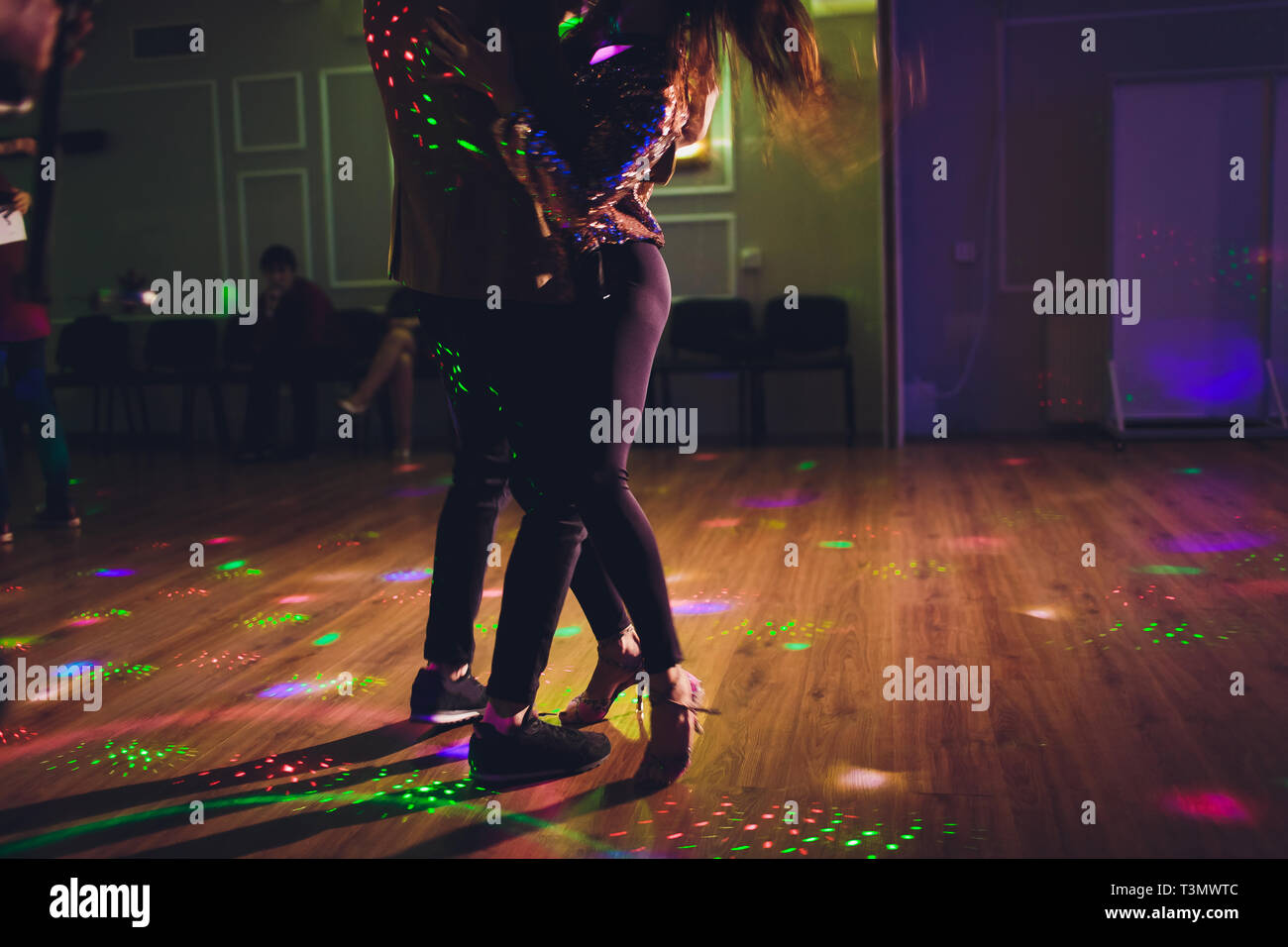 Legs of dancing people at the party Stock Photo - Alamy