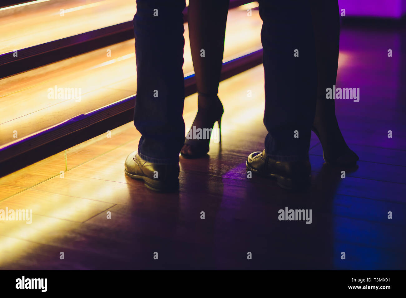 Legs of dancing people at the party Stock Photo - Alamy