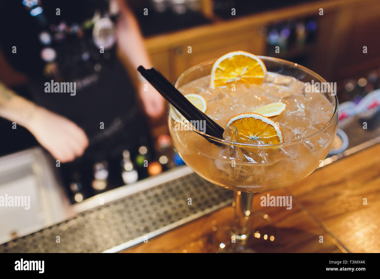 Alcohol in large round glass on bar background, Whisky, Brandy, Cognac ...