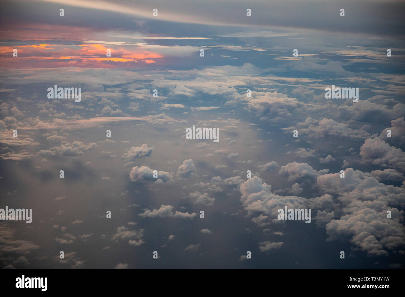 Clear Aerial view from aircraft window flying over Pacific Ocean in ...