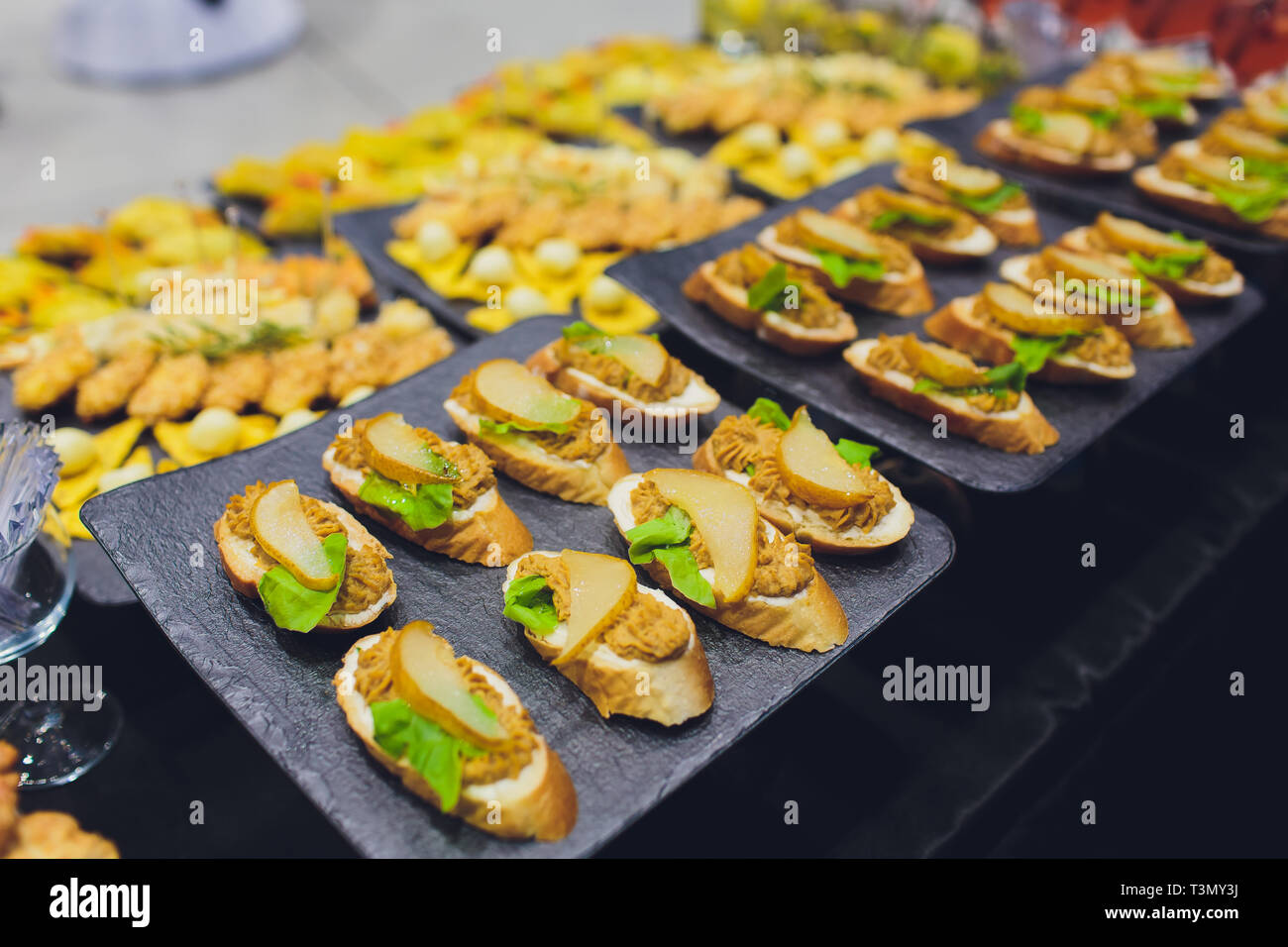 a lot of cold snacks on buffet table, catering Stock Photo - Alamy