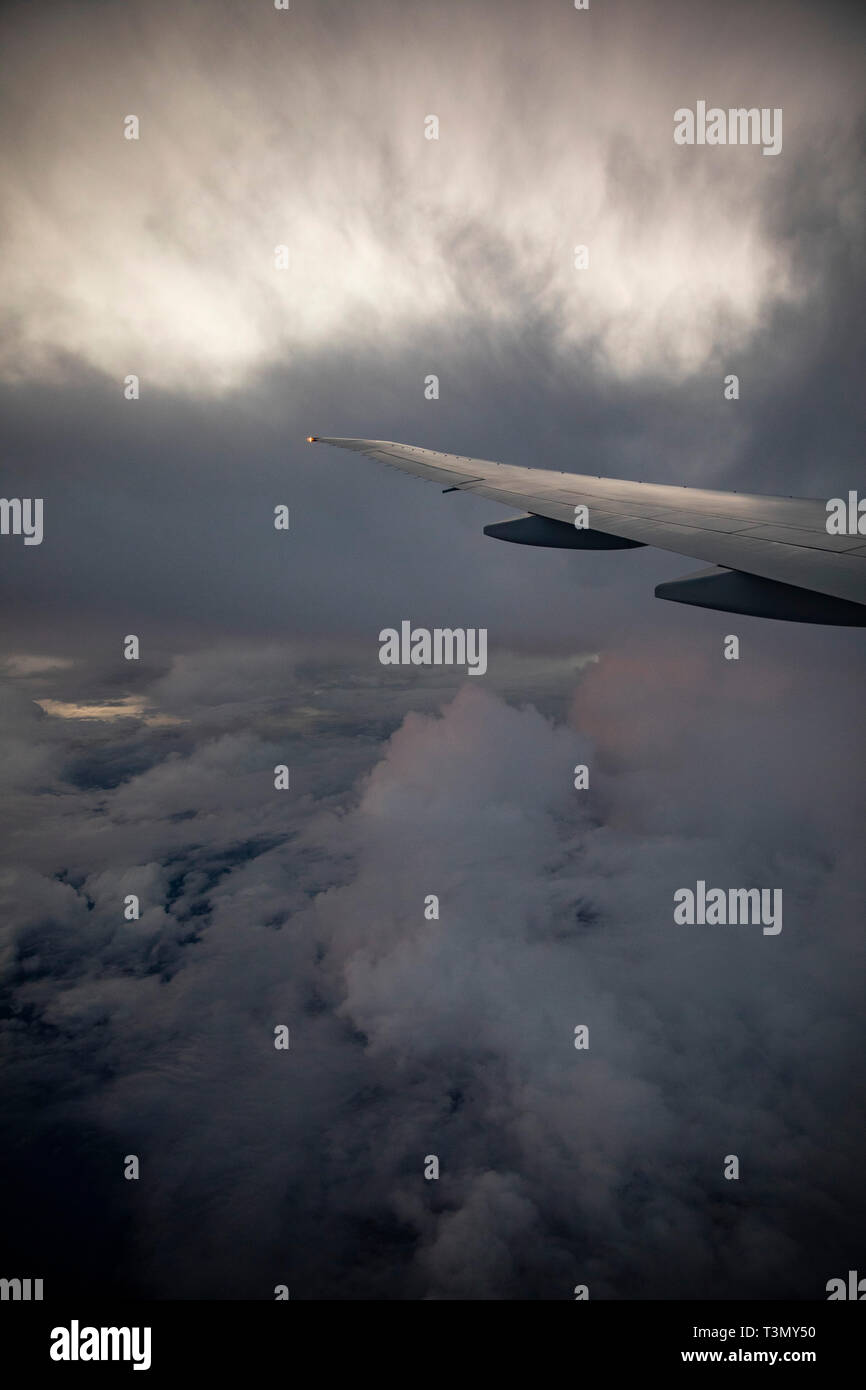 Clear Aerial view from aircraft window flying over Pacific Ocean in ...