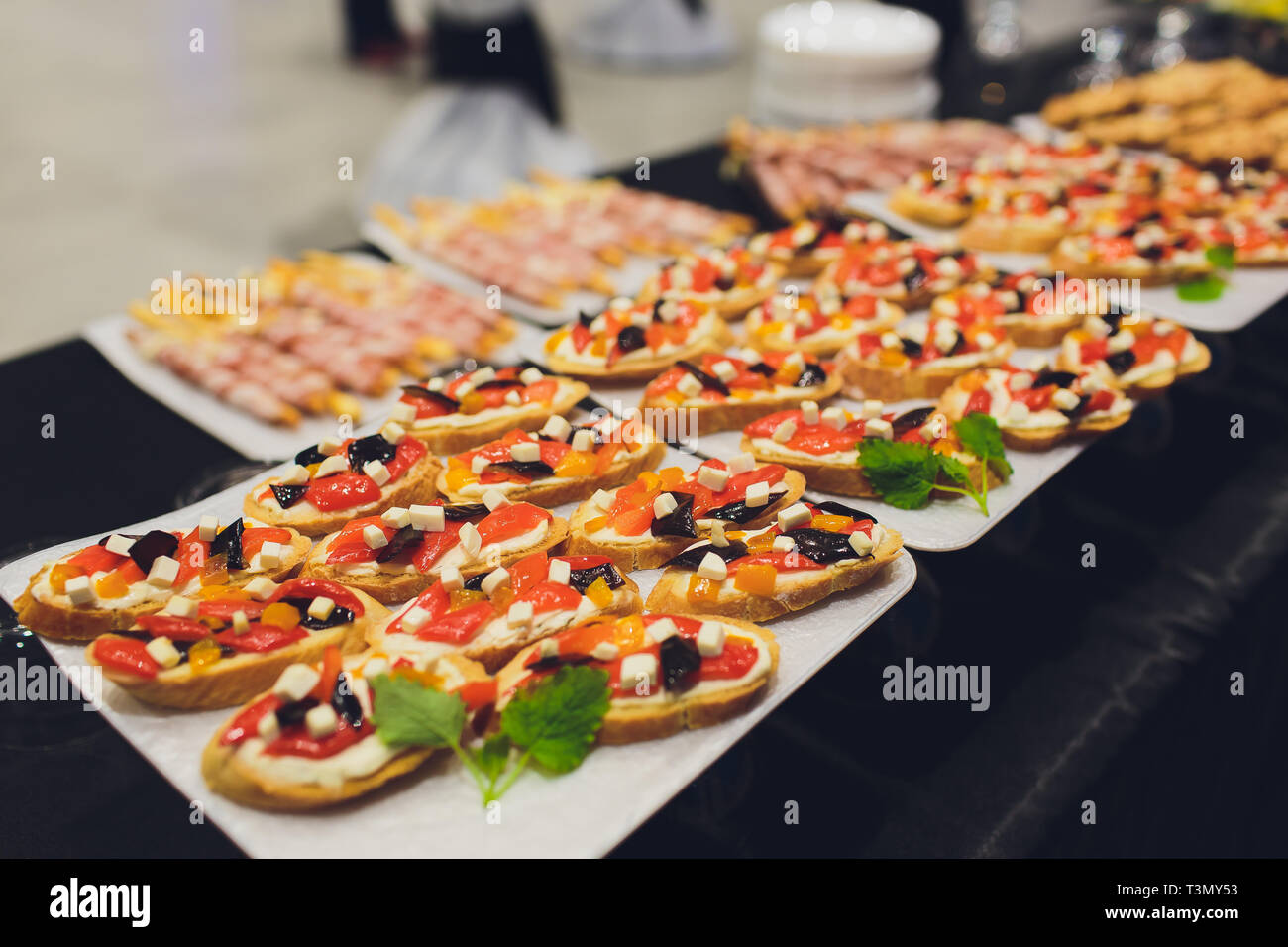 a lot of cold snacks on buffet table, catering Stock Photo - Alamy