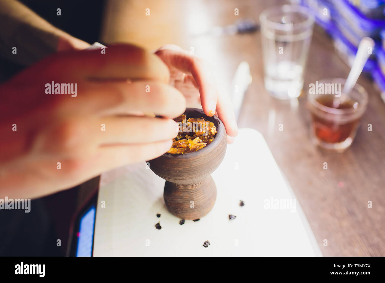 The process of cooking shisha, hookah bowl Stock Photo - Alamy