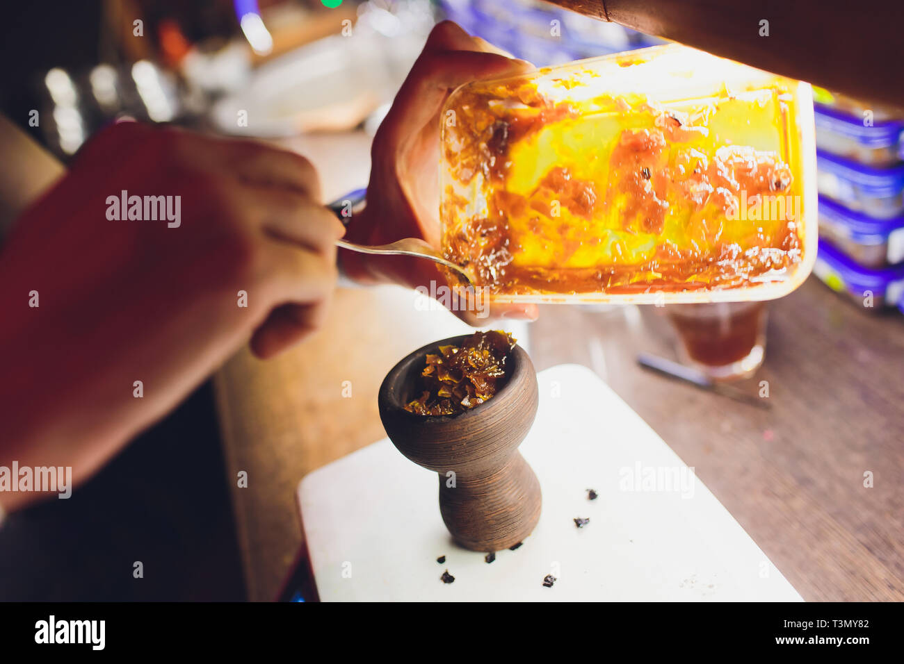 The process of cooking shisha, hookah bowl Stock Photo - Alamy