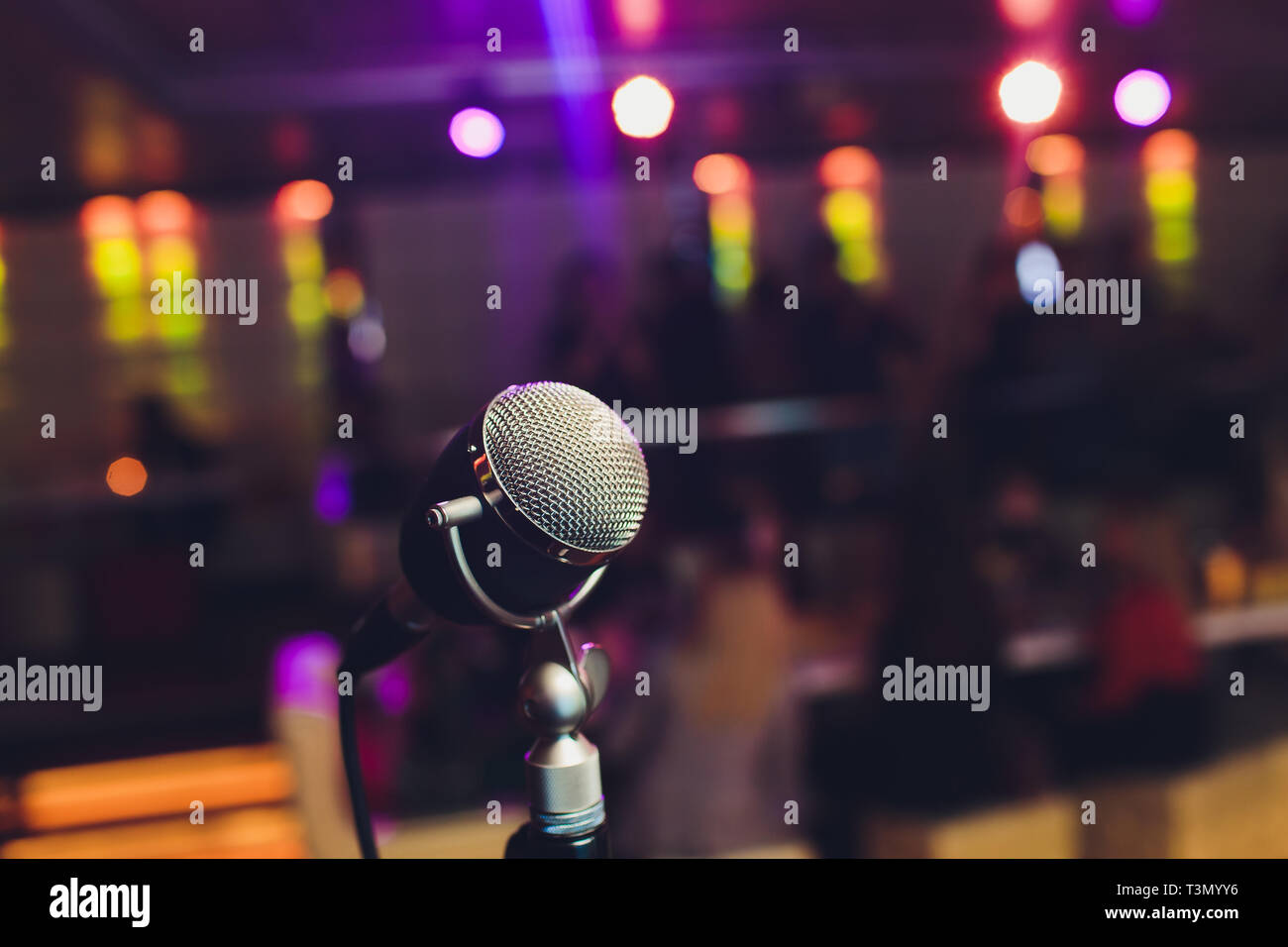 Microphone. Retro microphone. A microphone on stage. A pub. Bar ...