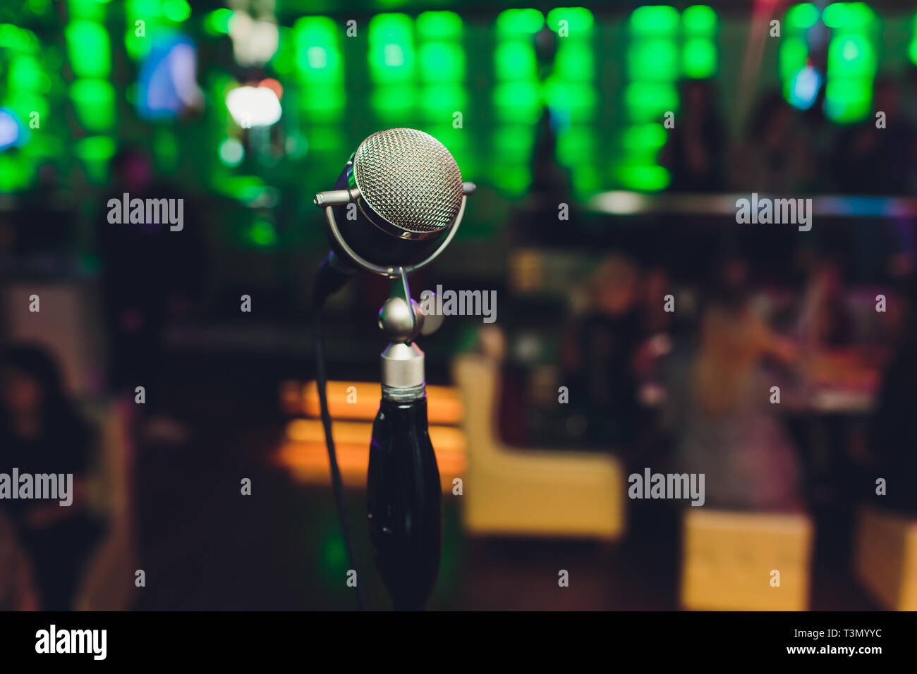 Microphone. Retro microphone. A microphone on stage. A pub. Bar ...