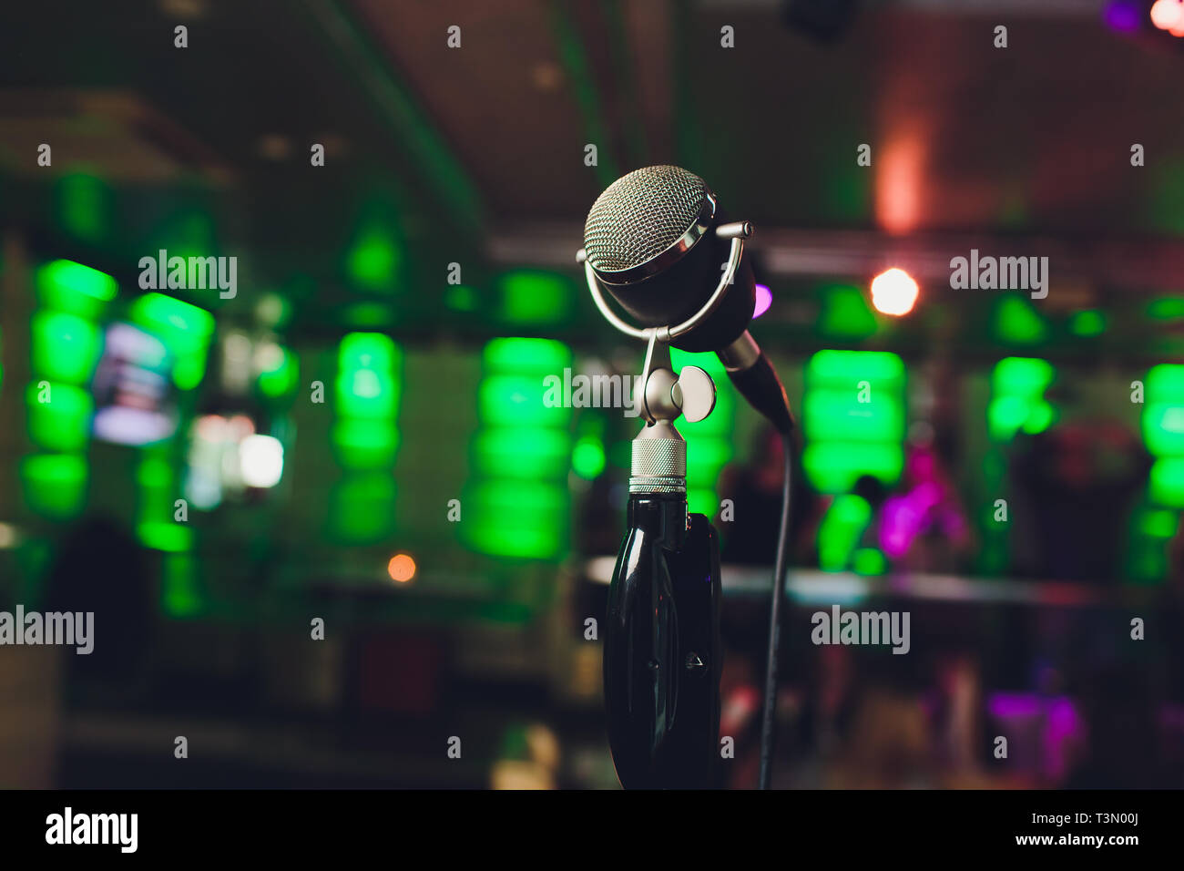 Microphone. Retro microphone. A microphone on stage. A pub. Bar ...