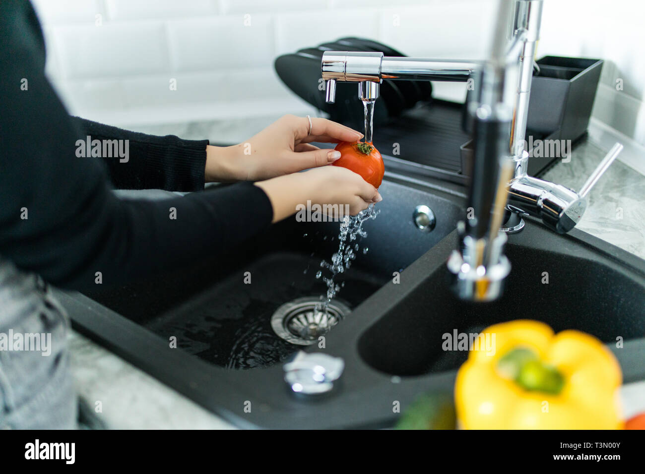 Washing tomato in running water hi-res stock photography and images - Alamy