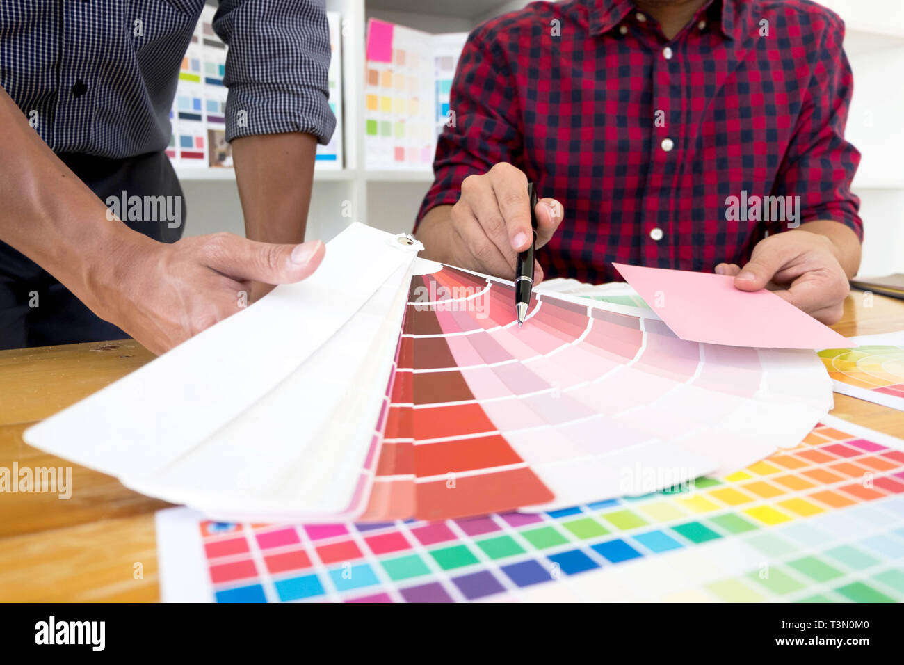 Graphic designers choose pink tones from the color bands to design ...