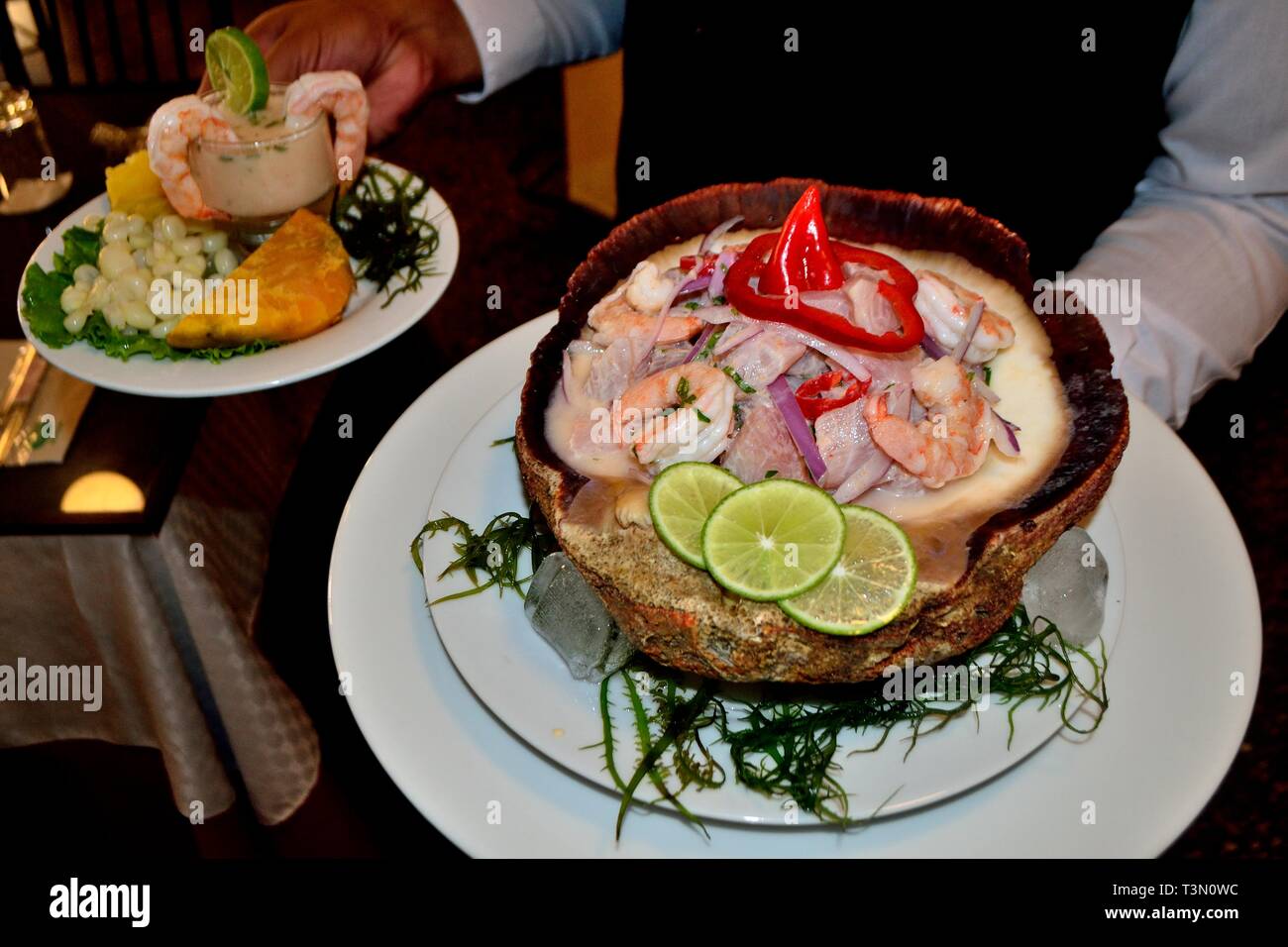 Typical ceviche presented in oyster shell -Restaurant in LIMA ...