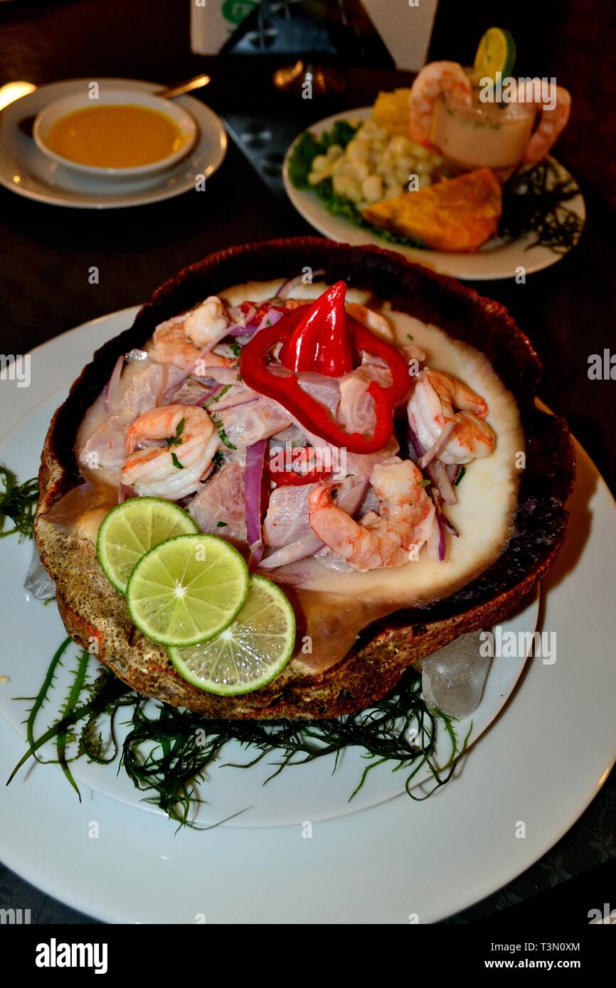Typical ceviche presented in oyster shell -Restaurant in LIMA ...