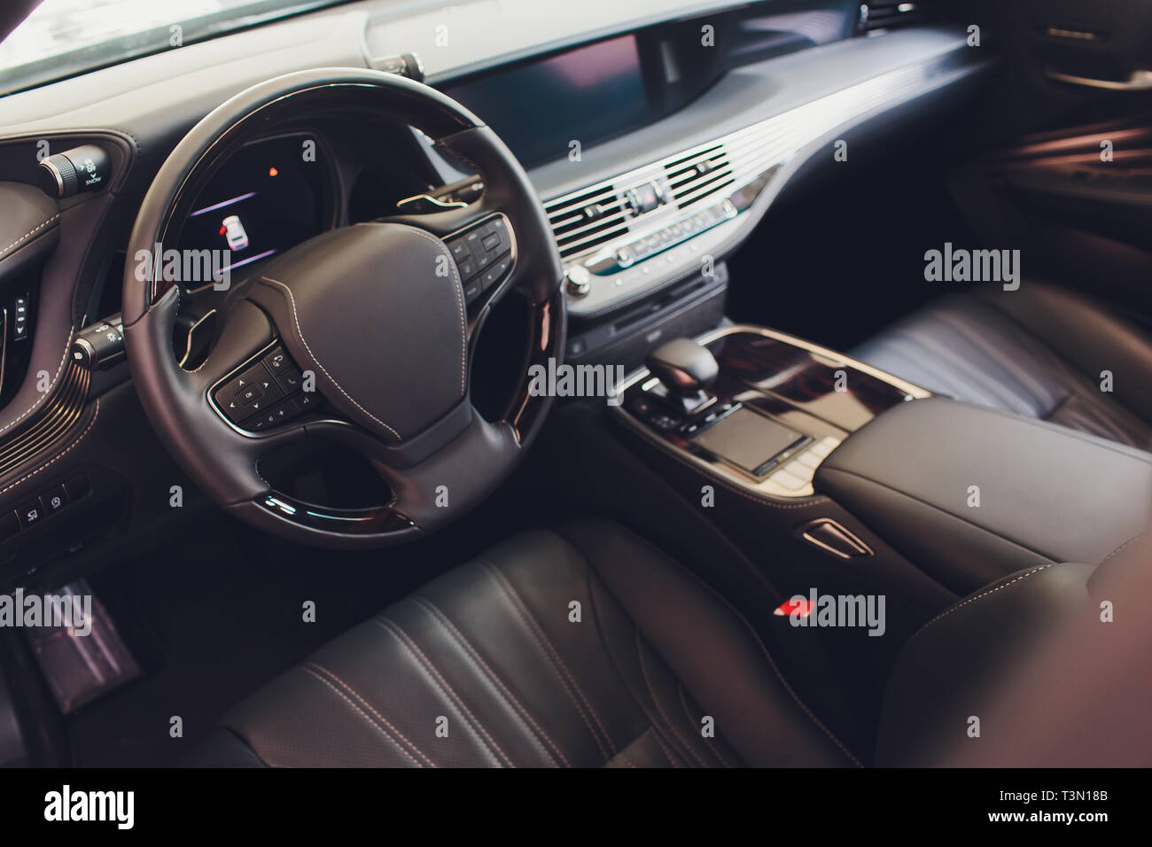 car interior. Modern car speedometer and illuminated dashboard ...