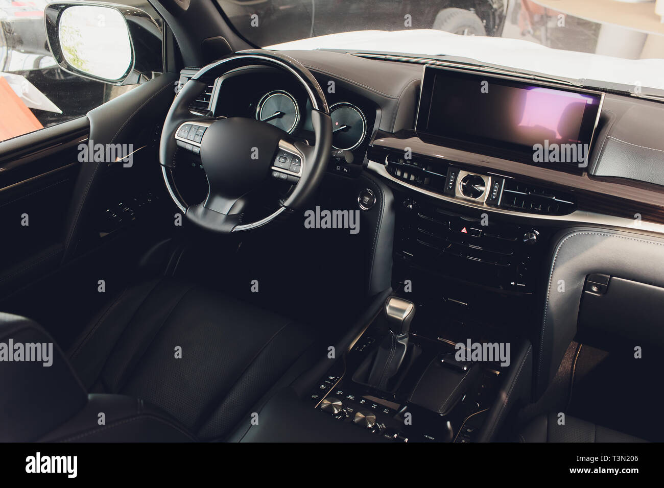 car interior. Modern car speedometer and illuminated dashboard ...