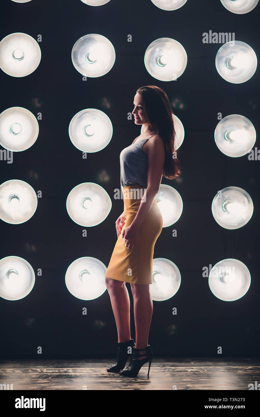 Full body woman in denim back on dark background Stock Photo - Alamy