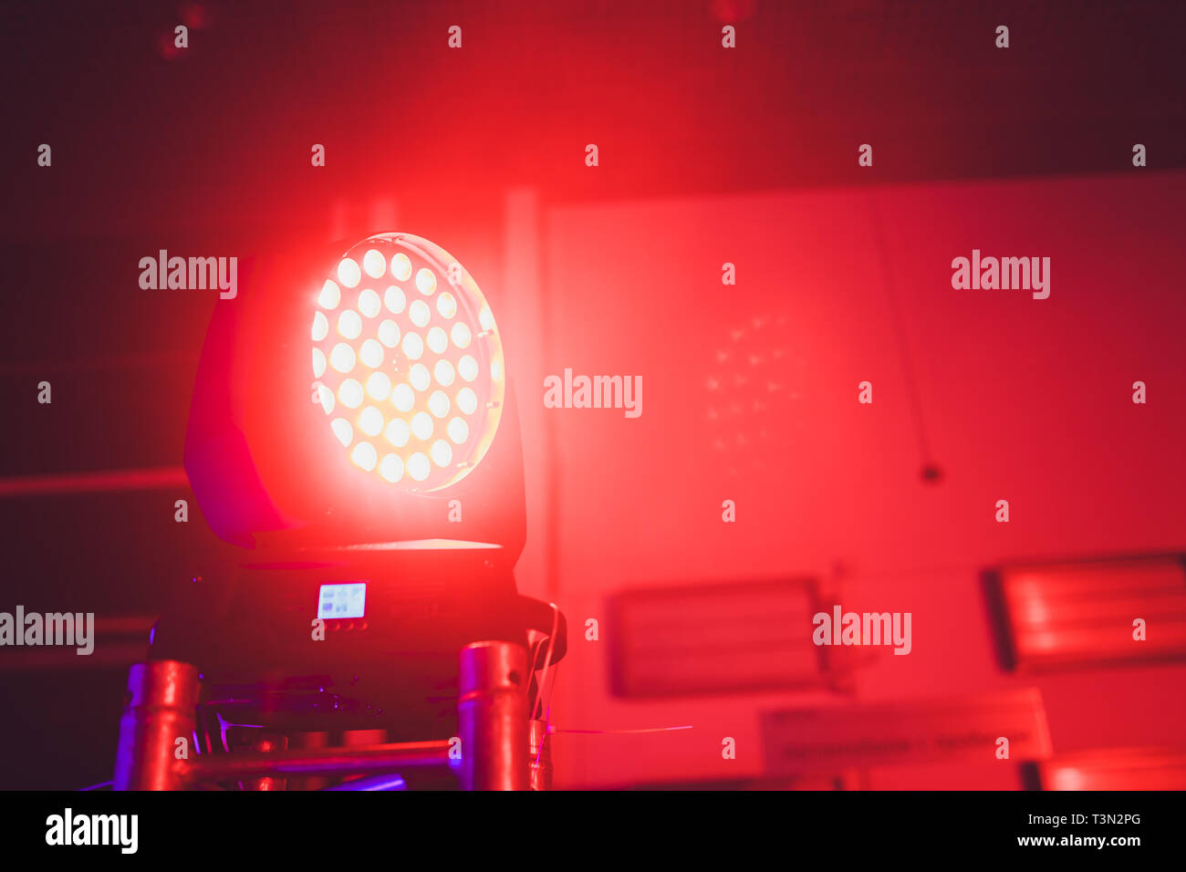 concert stage with red spot light and smoke Stock Photo - Alamy