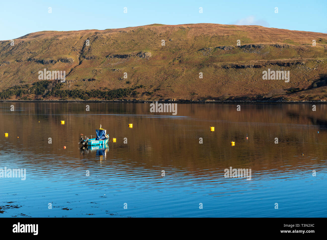 Colourful reflections in the calm water of Loch Harport on Isle of Skye ...