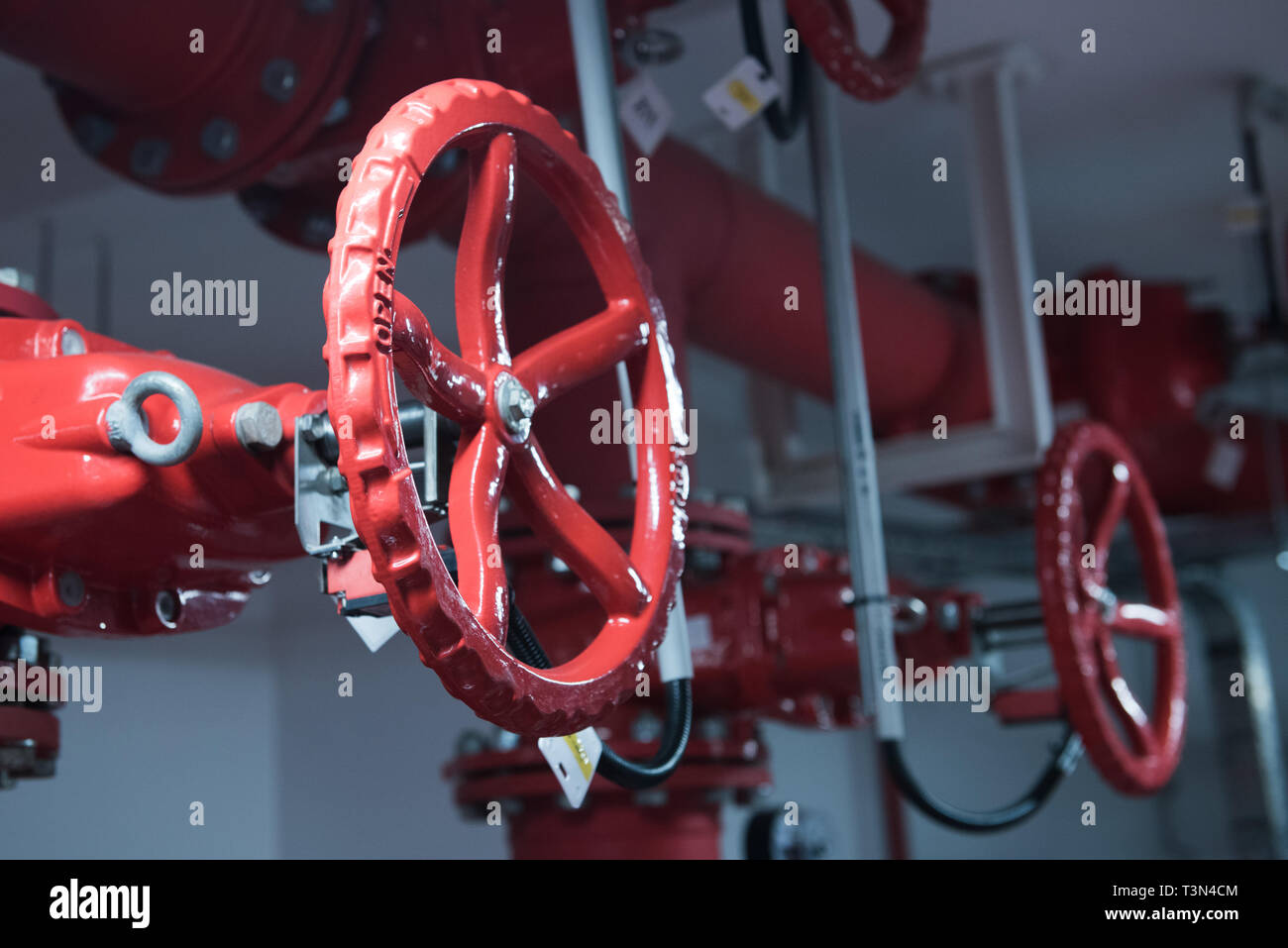 Refinery pipe red valve hi-res stock photography and images - Alamy