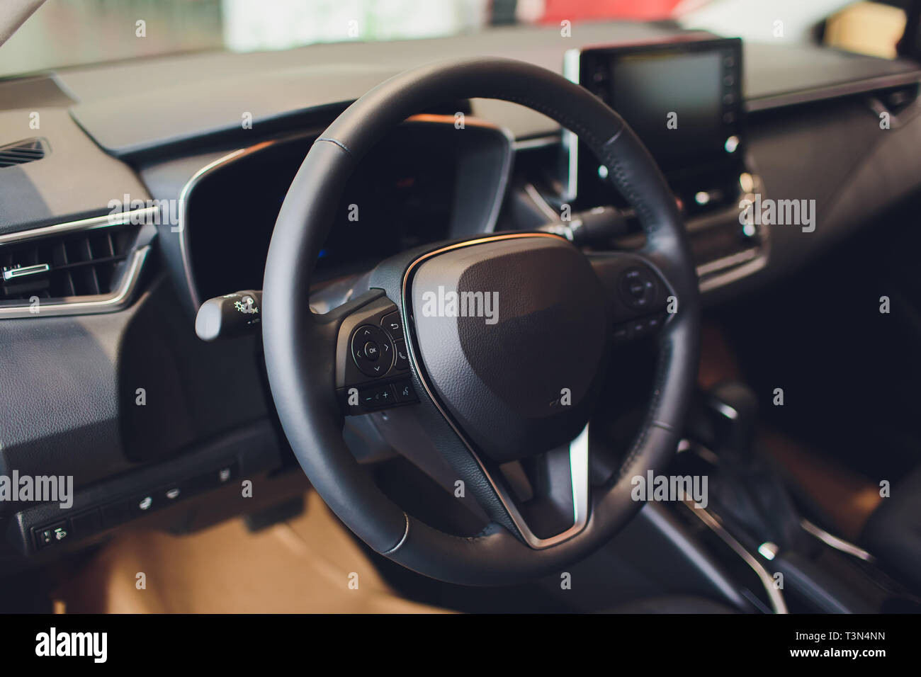 Dark luxury car Interior - steering wheel, shift lever and dashboard ...