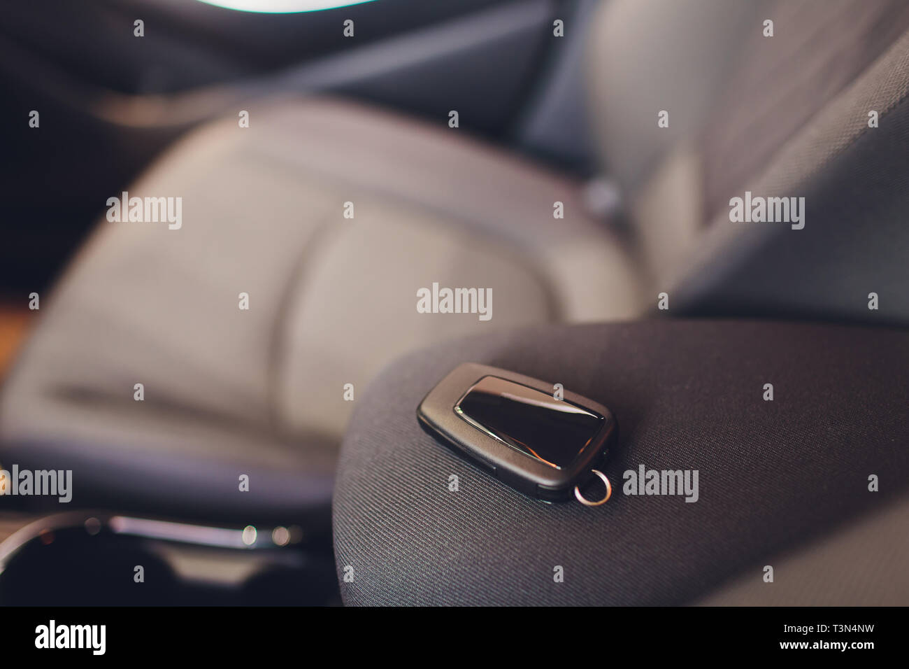 Closeup inside vehicle of wireless key ignition. Start engine key. Car ...