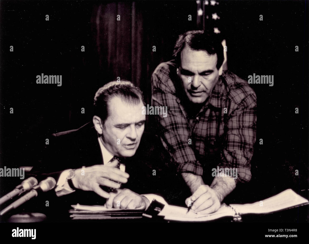Movie director Oliver Stone and Anthony Hopkins in the movie Nixon ...