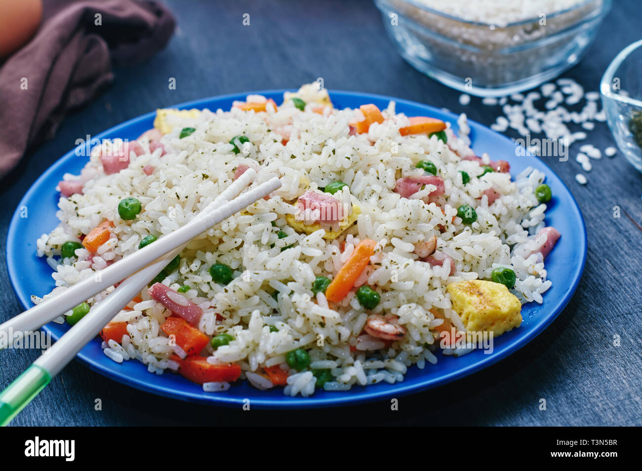 rice 3 delights in bamboo fiber dish with resin sticks Stock Photo - Alamy
