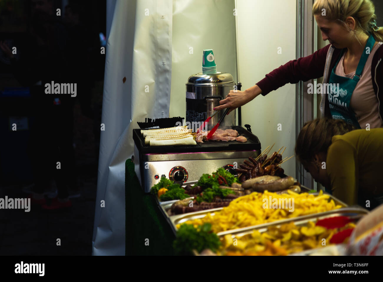 LVIV, UKRAINE - September 15, 2018: street food concept. people ...
