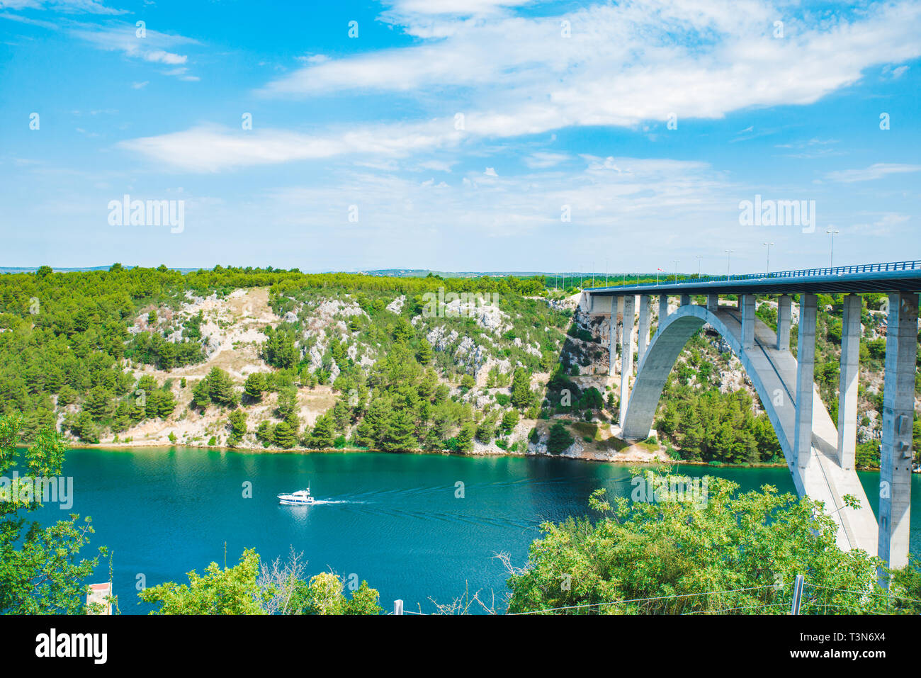 highway bridge cross river with blue water. summer time Stock Photo - Alamy