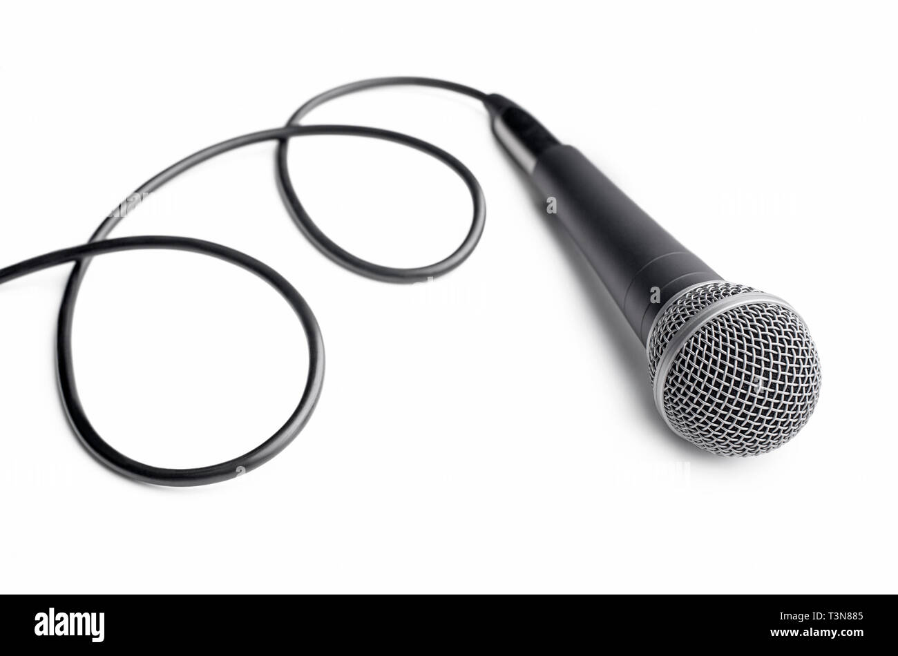 Microphone with curly cable on white background Stock Photo - Alamy