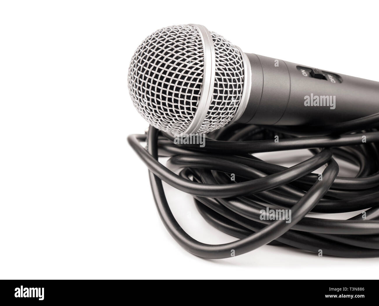Microphone with curly cable on white background Stock Photo - Alamy