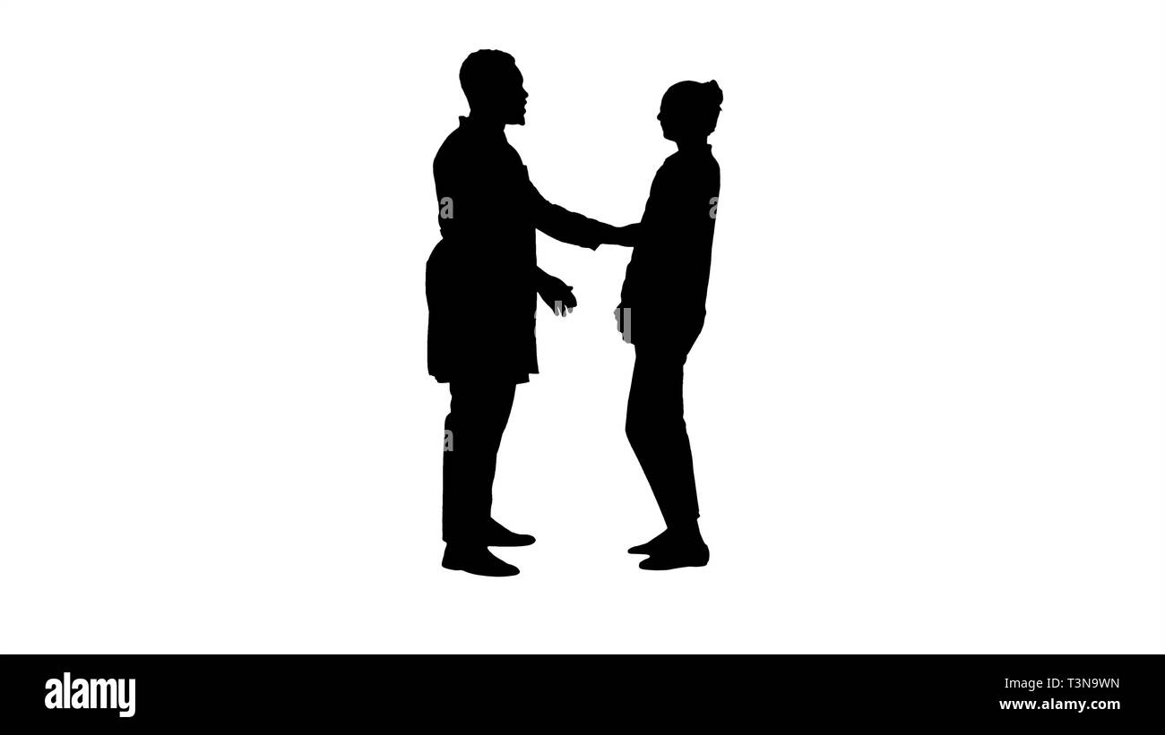 Silhouette Doctor telling good news to a patient Stock Photo - Alamy
