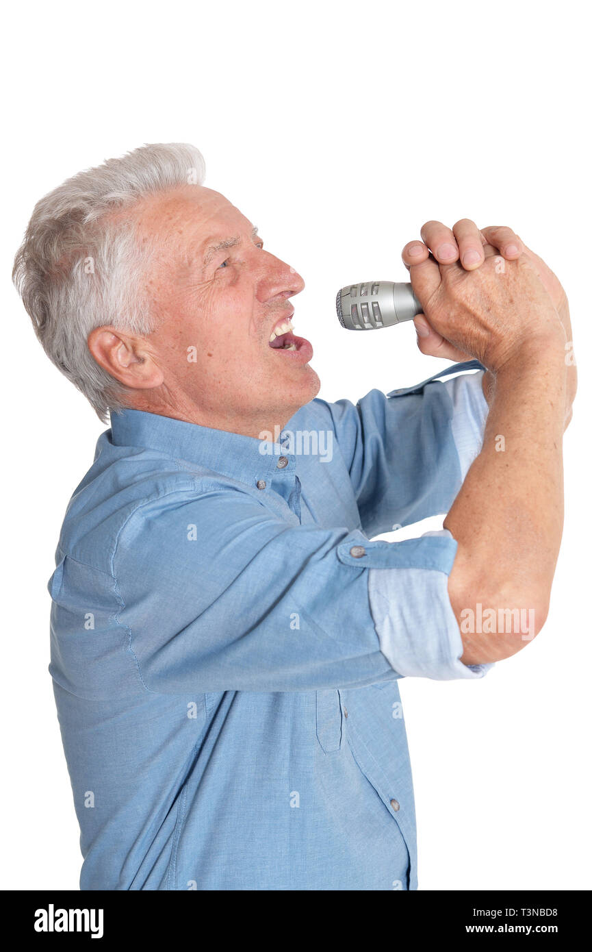 Aged man singing in microphone hi-res stock photography and images - Alamy