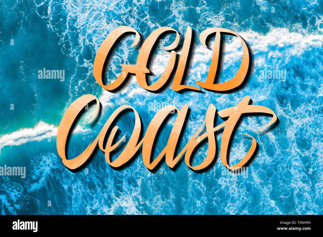 Gold Coast lettering over vivid blue crushing waves Stock Photo - Alamy