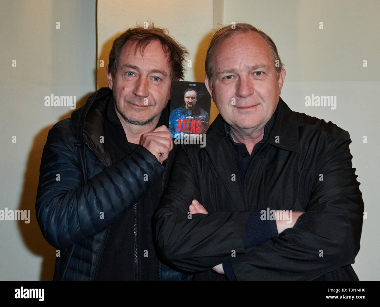Berlin, Germany. 10th Apr, 2019. Actor Thorsten Merten (l) leans ...