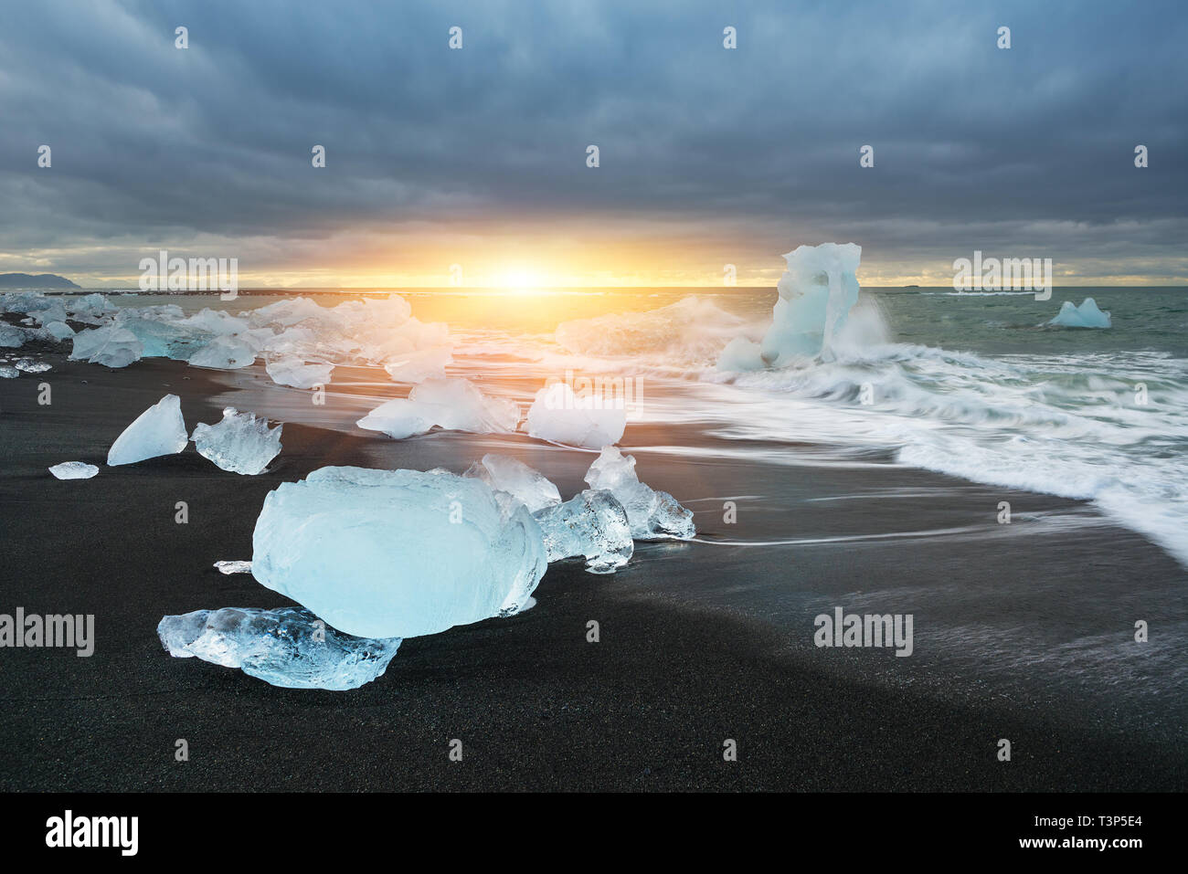 Icy beach in Iceland, Europe. Ice on the black volcanic sand on the ...