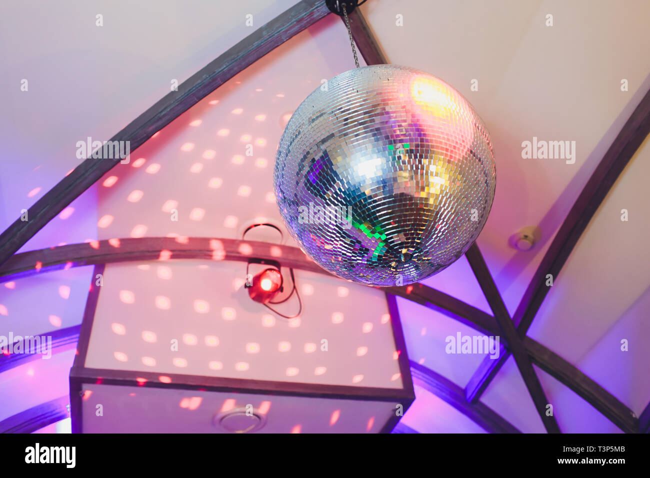 Disco ball with fireworks, night party background photo Stock Photo - Alamy