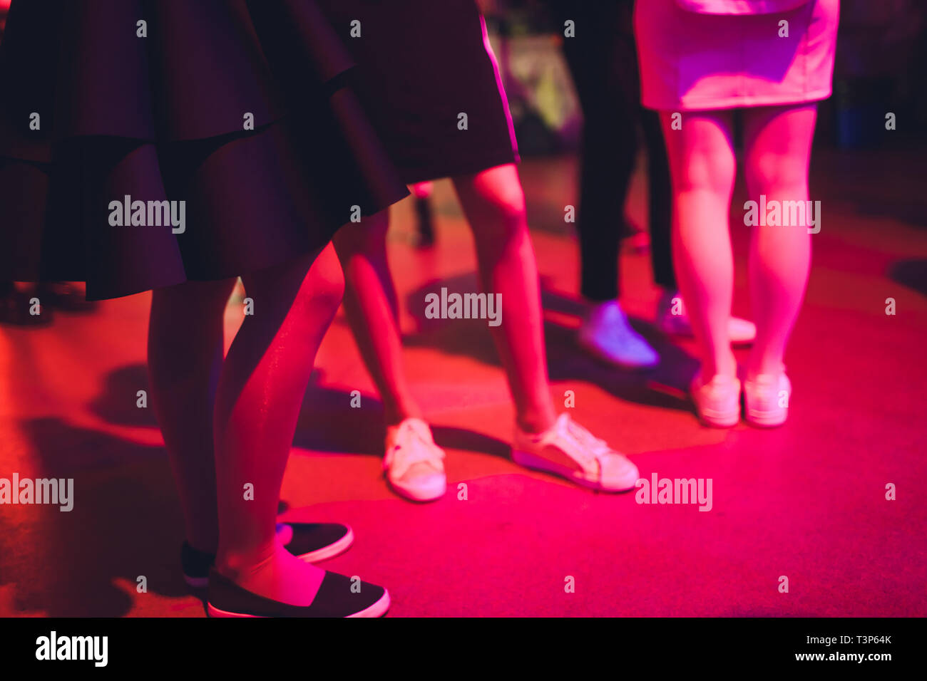 Legs of dancing people at the party Stock Photo - Alamy