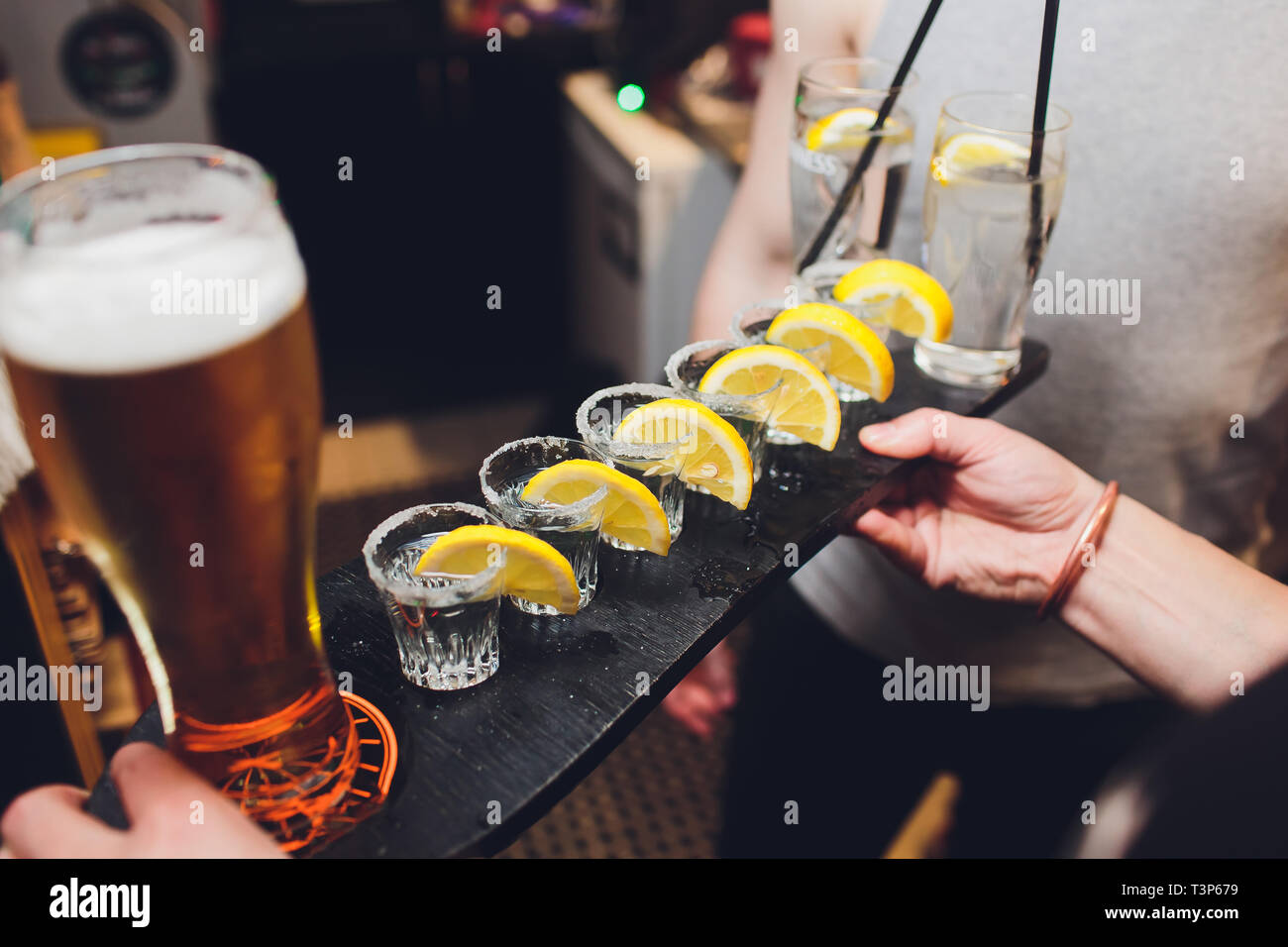Male Hands Cheer With Glasses Of Shot Or Liqueur Friends Drink Shot Or Liqueur And Cheers Male