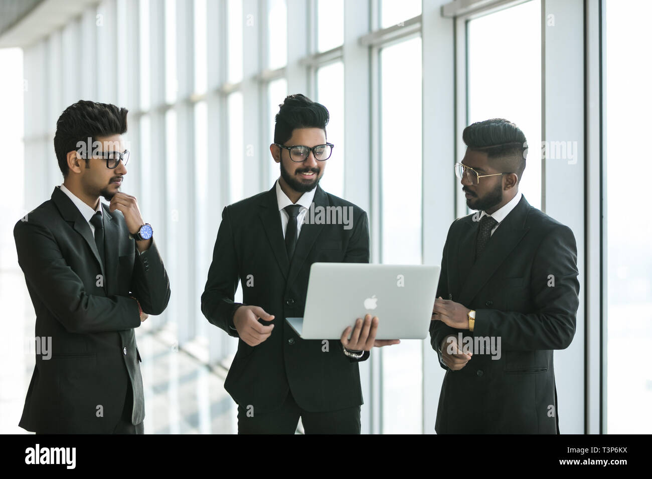 Indian businessmen working on project hi-res stock photography and ...