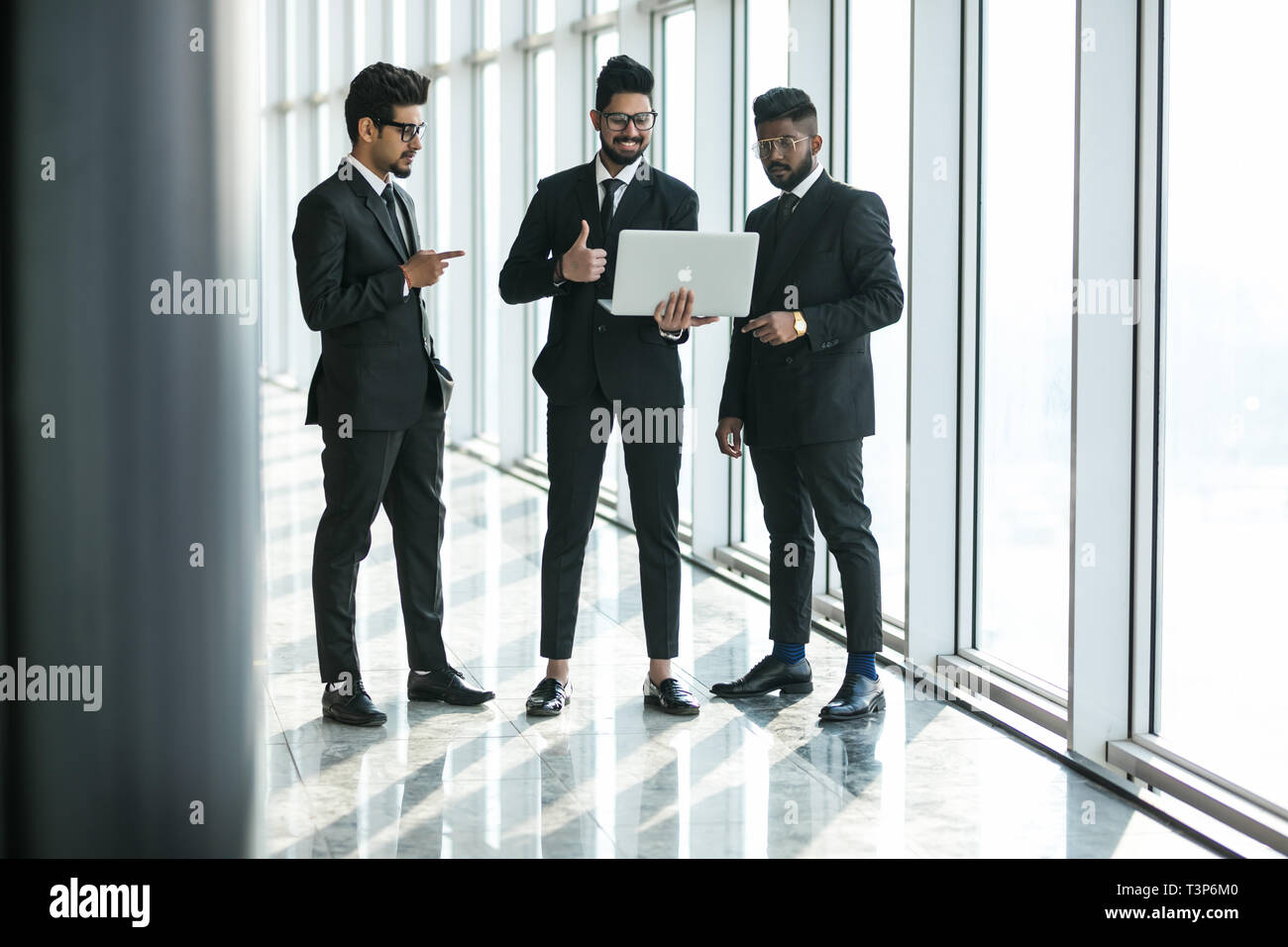 Indian businessmen working on project hi-res stock photography and ...