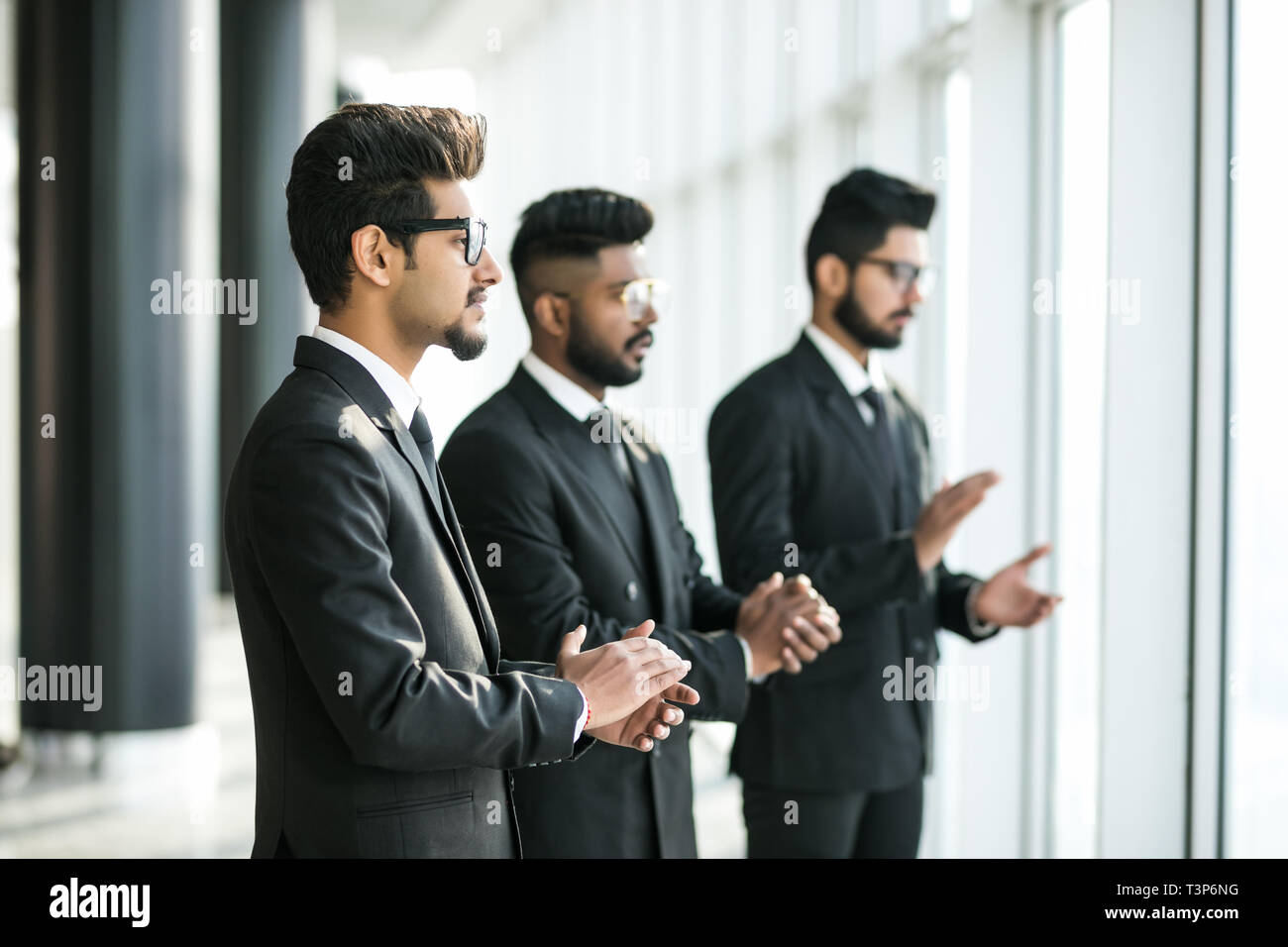 Indian business people standing clapping hi-res stock photography and ...