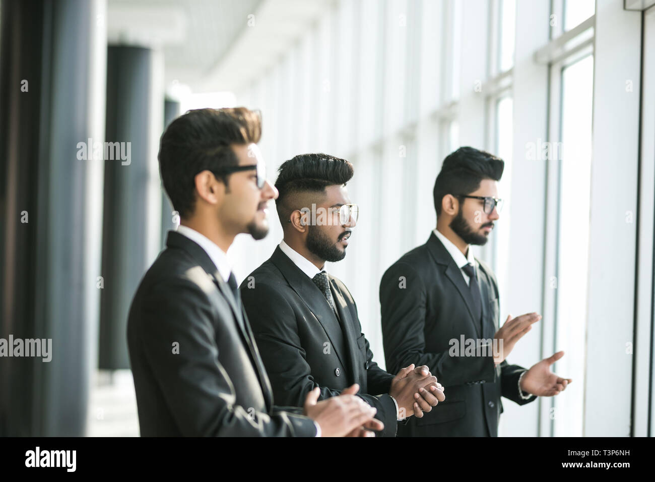 Indian business people standing clapping hi-res stock photography and ...